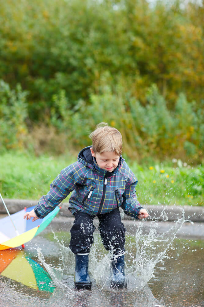 Boy jumping in puddle - MACHE - Minnesota Association of Christian Home ...